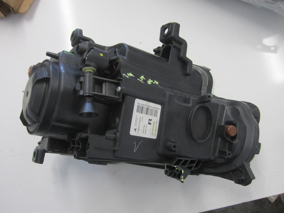 Jeep Cherokee- Headlight HALOGE MISSING 1 TAB- 68102846AE: Used Auto ...